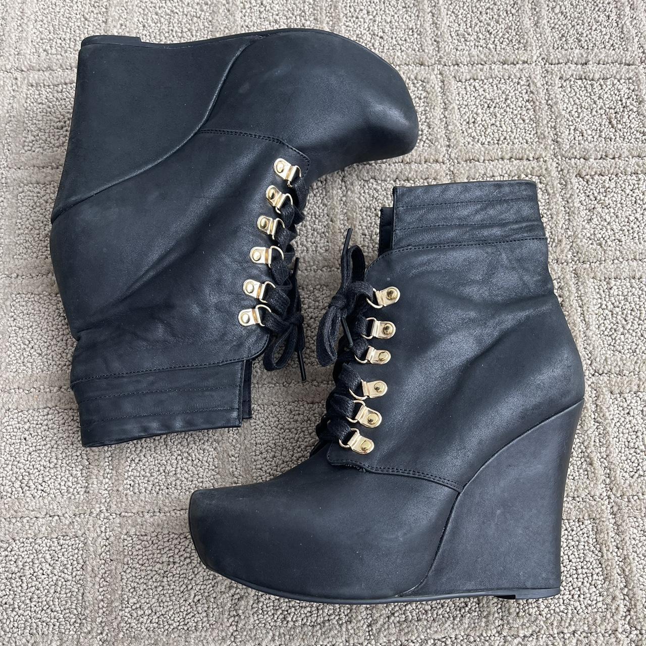 Wedged heeled boots by Restricted. Black with gold... - Depop