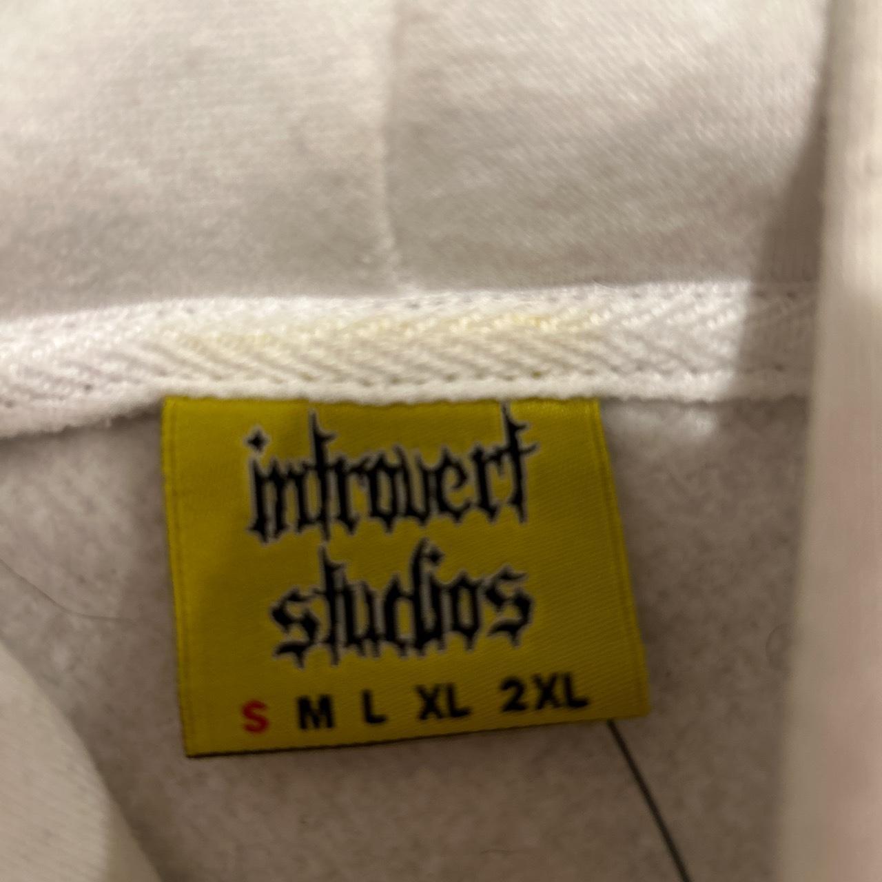 Introvert studios hoodie Worn a couple times Offer me - Depop