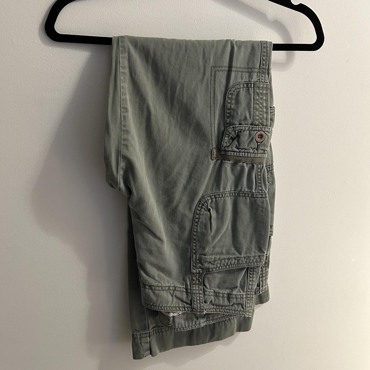 Low rise light green cargo pants. Size 11 but runs... - Depop