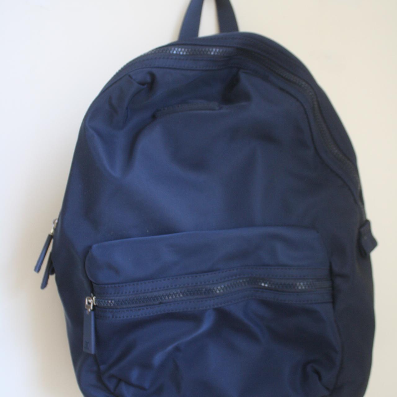 Preppy navy blue Tommy Hilfiger small backpack. - Depop
