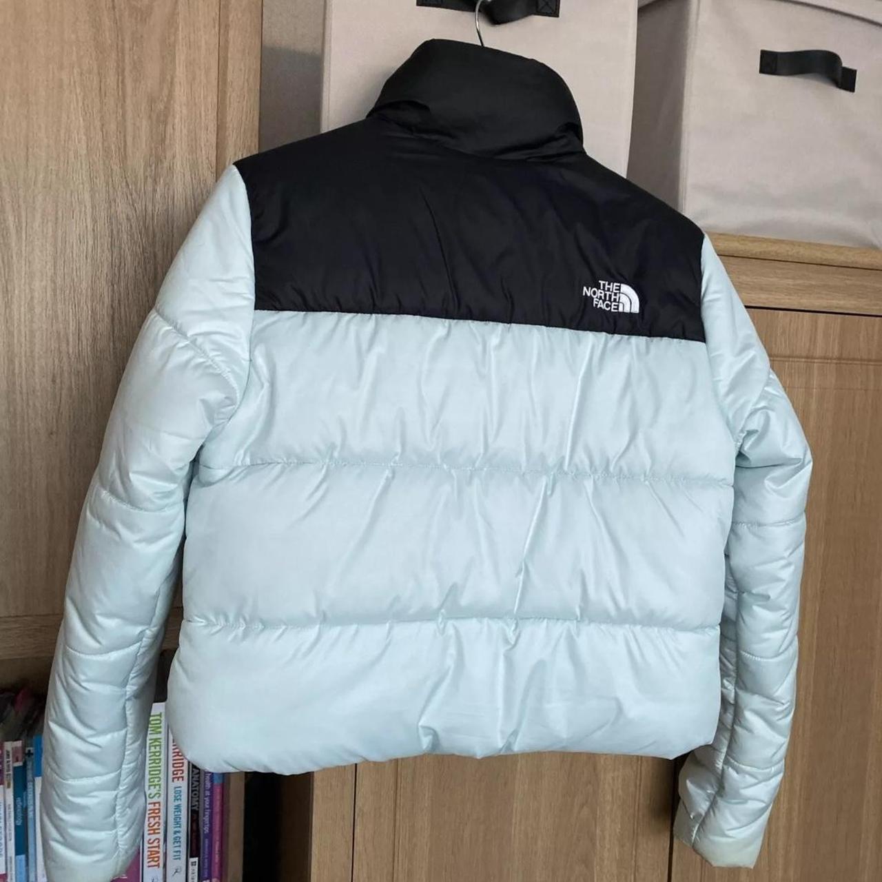 Light blue The North Face puffer jacket | Depop