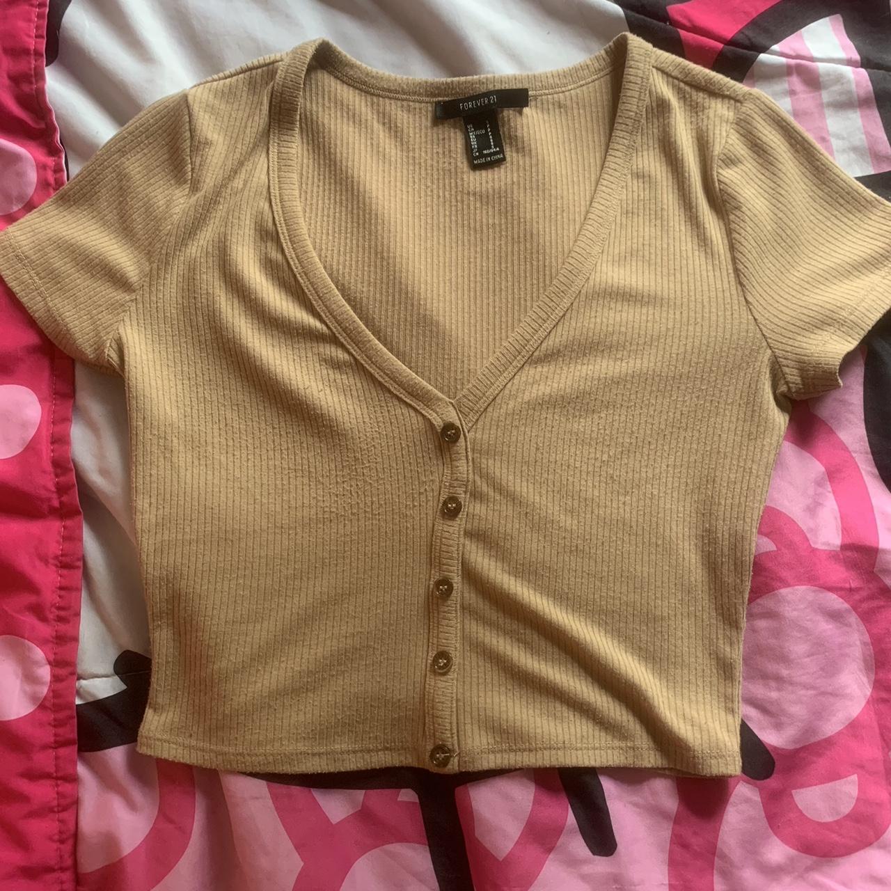 Small tan cropppp, super comfy and makes ur bewbs... - Depop