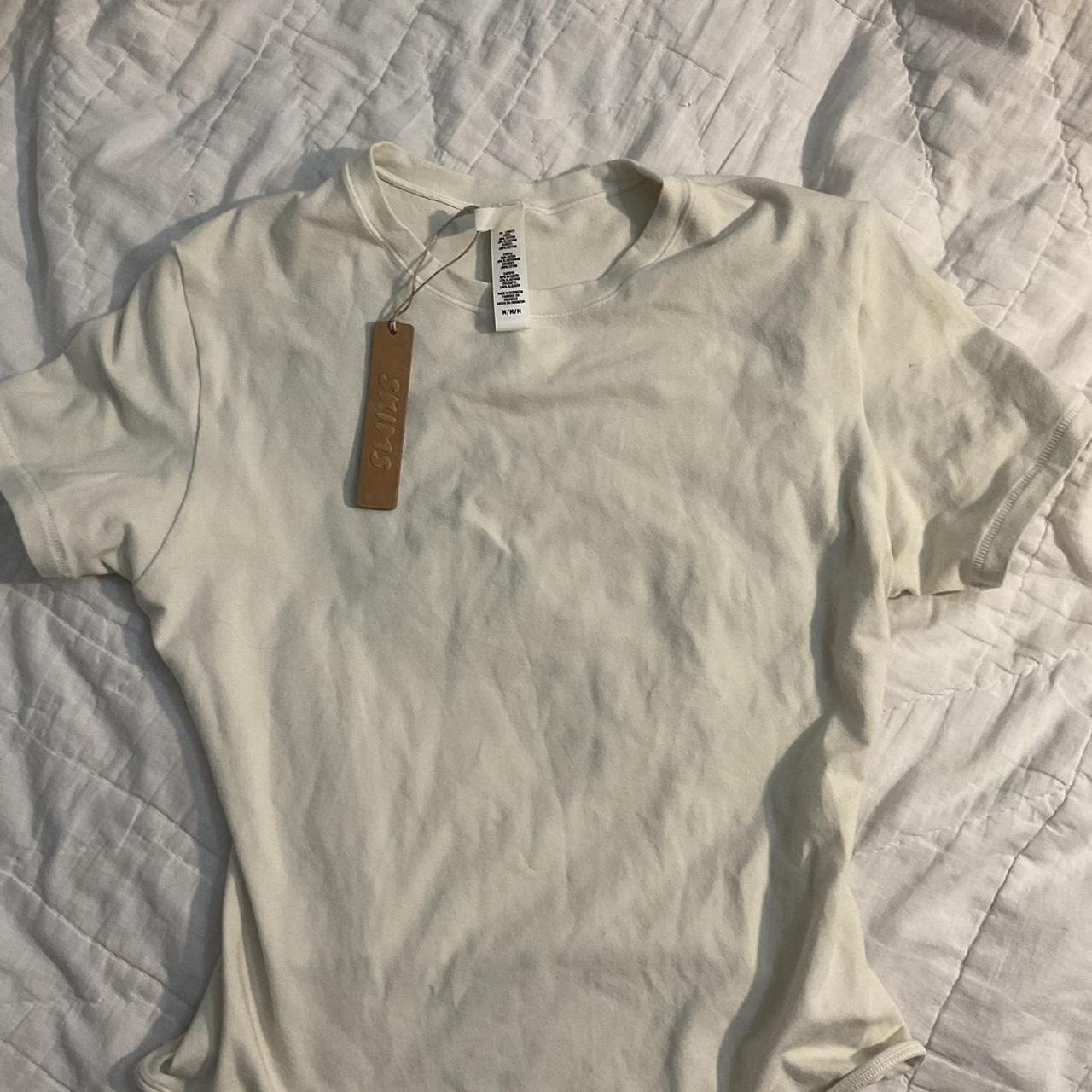 Cream Skims bodysuit. Brand new with tags. Fits... - Depop
