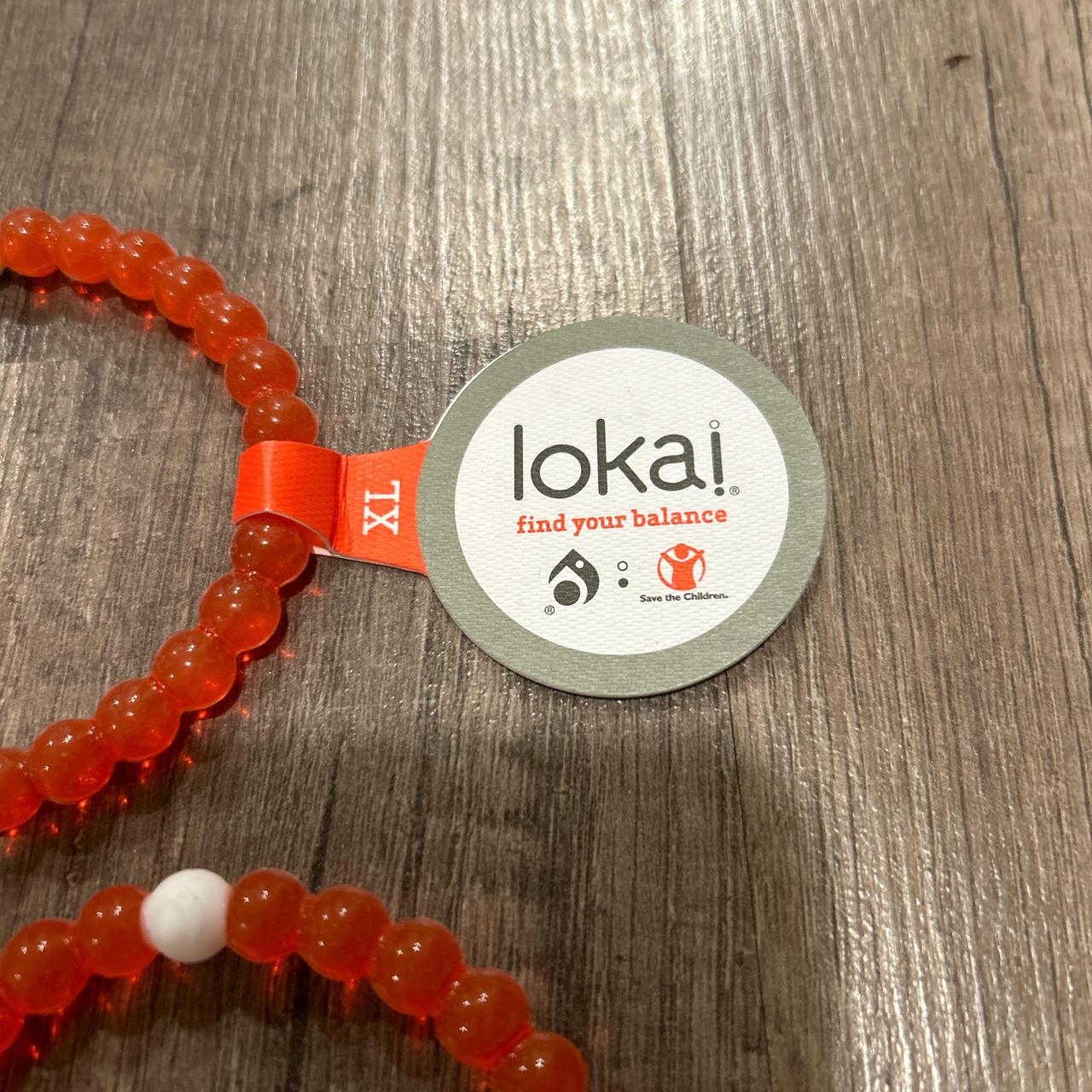 set of 2 red lokai bracelets! super cute and brand... - Depop