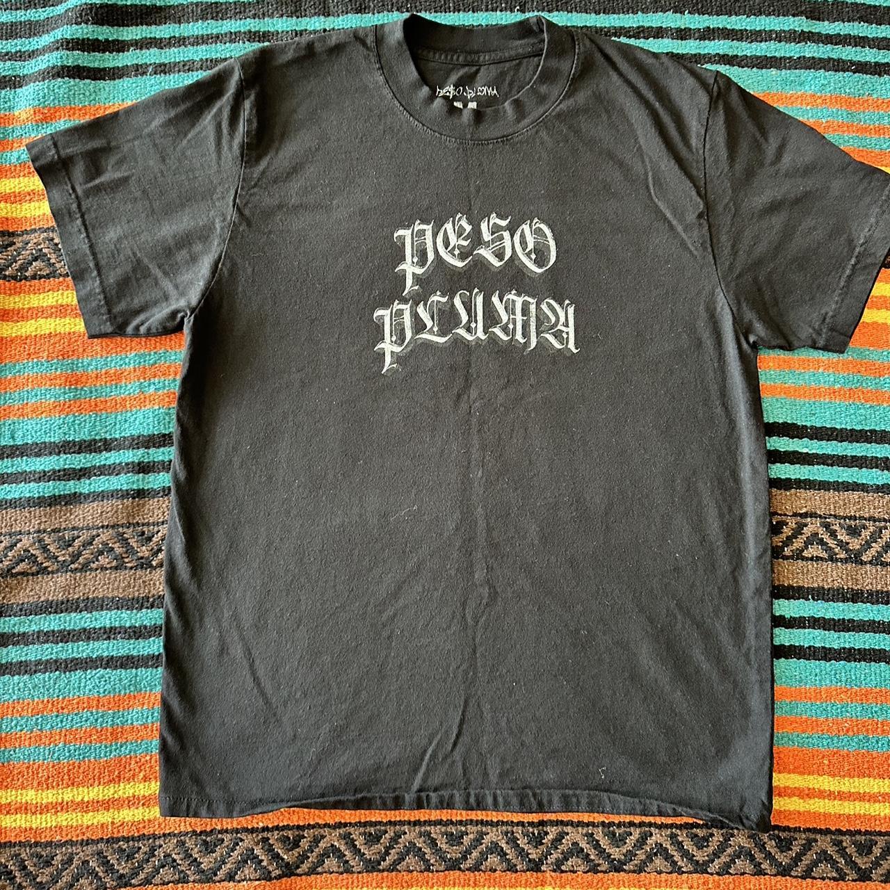 Black and white éxodo Peso Puma tour T-shirt... | Depop