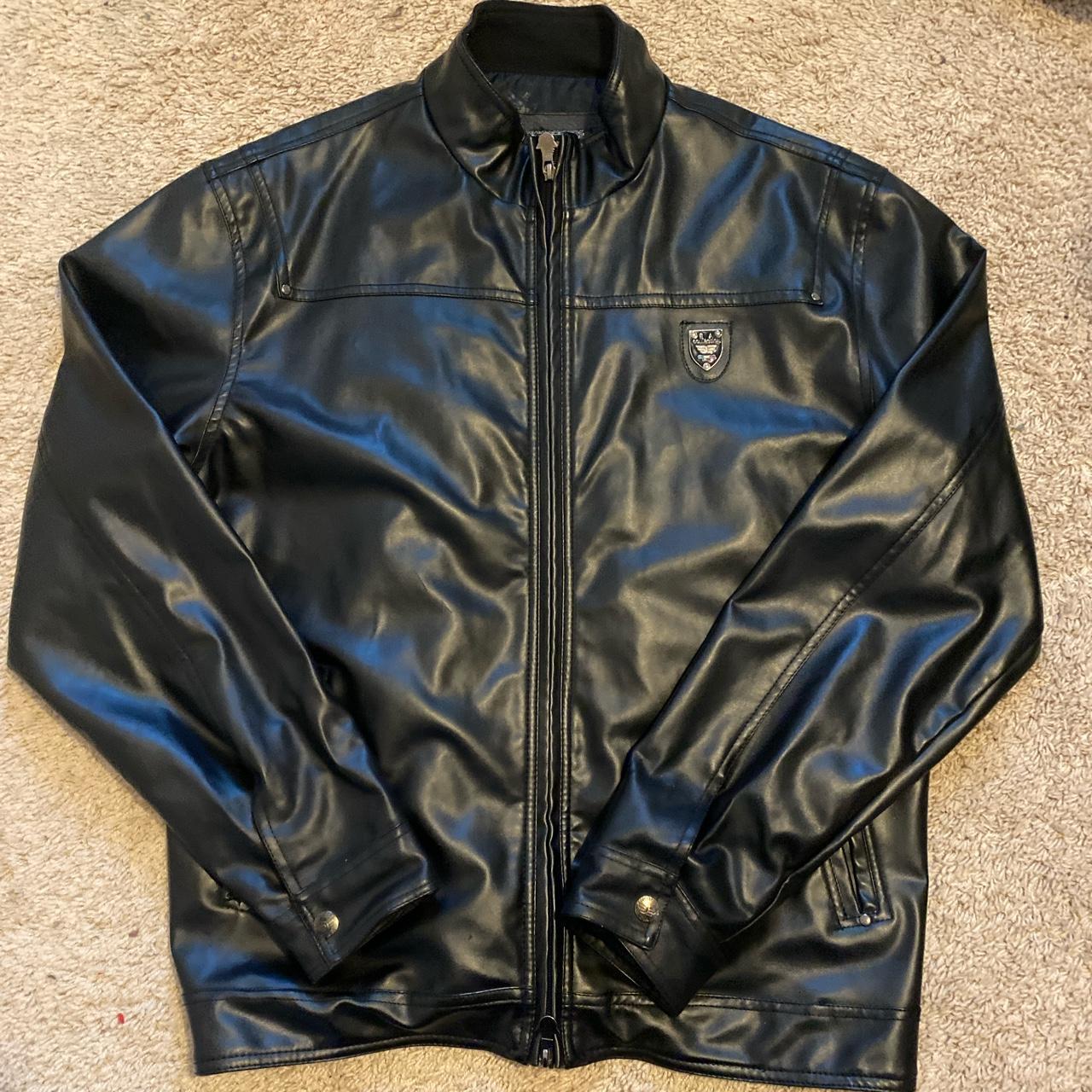 black large leather jacket branded by ea collection... - Depop