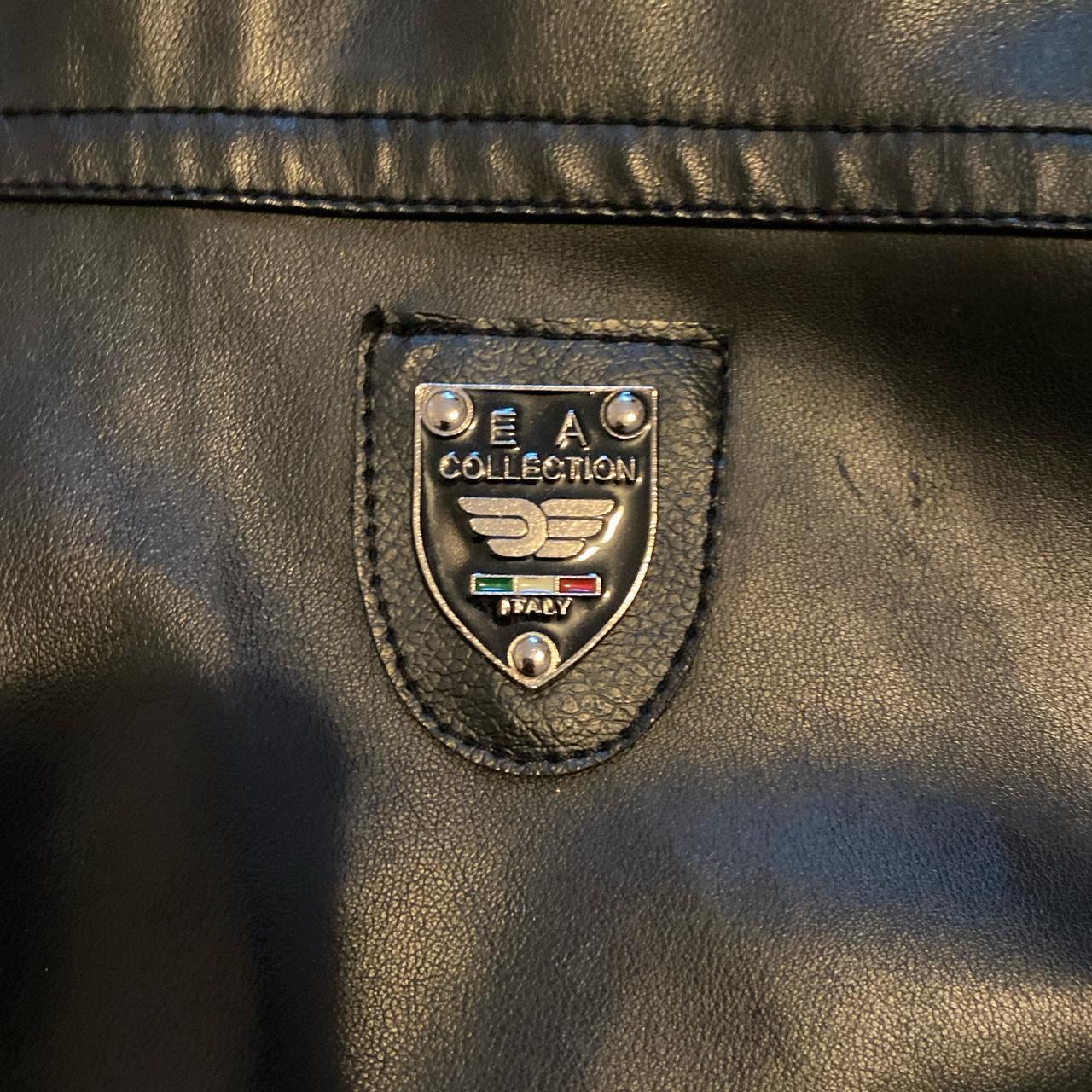 black large leather jacket branded by ea collection... - Depop