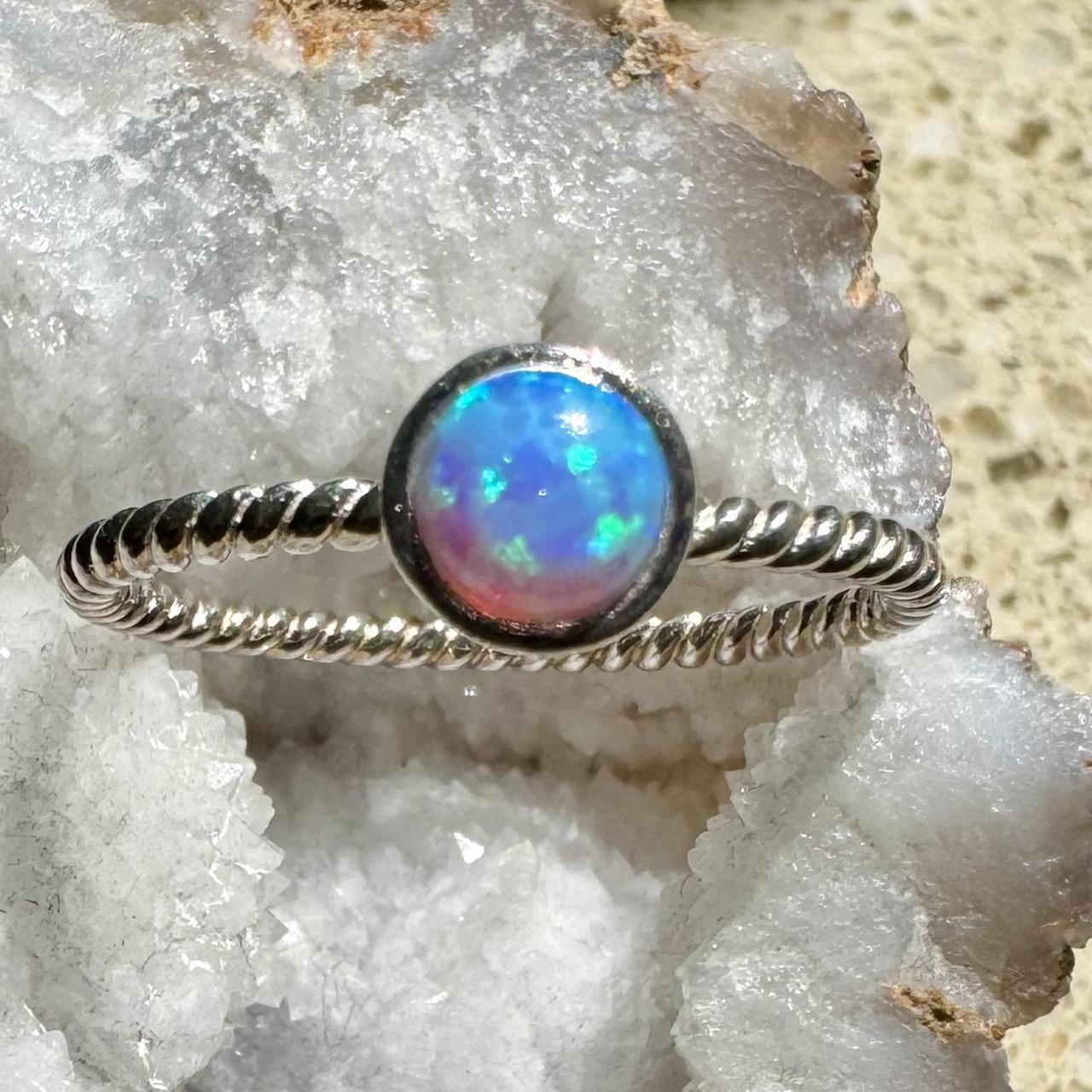 Blue Opal & Silver Ring. Opal is bezel set on a... - Depop