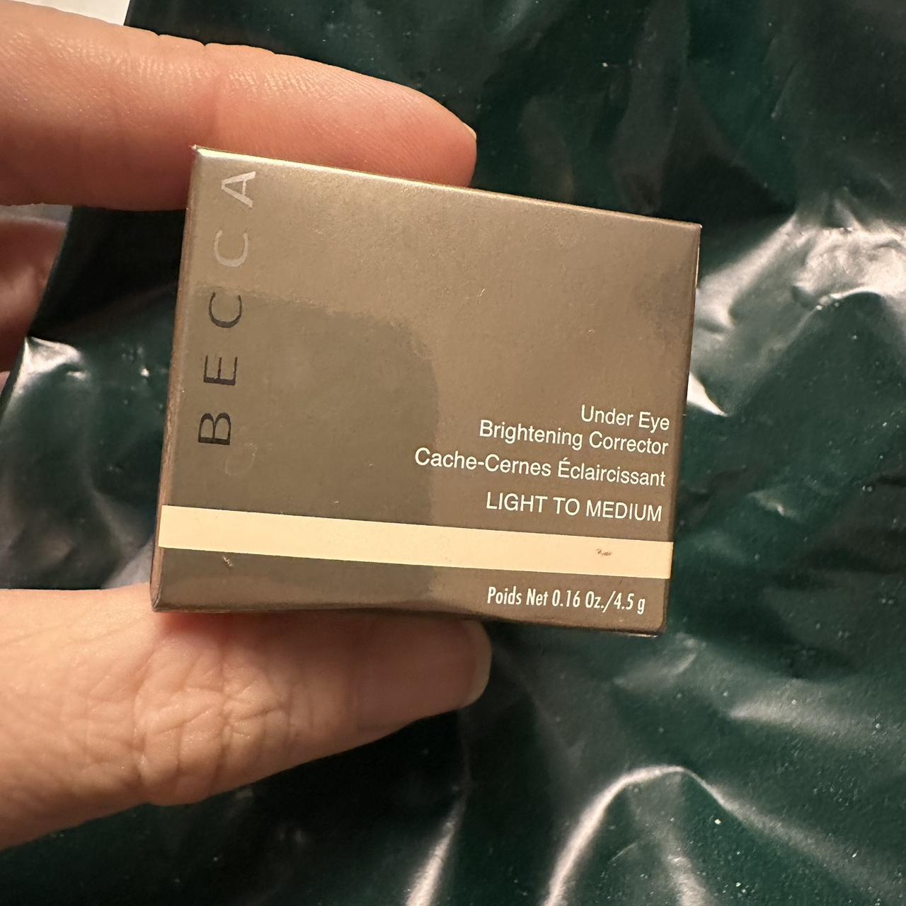 Becca under eye brightening corrector- light to... - Depop
