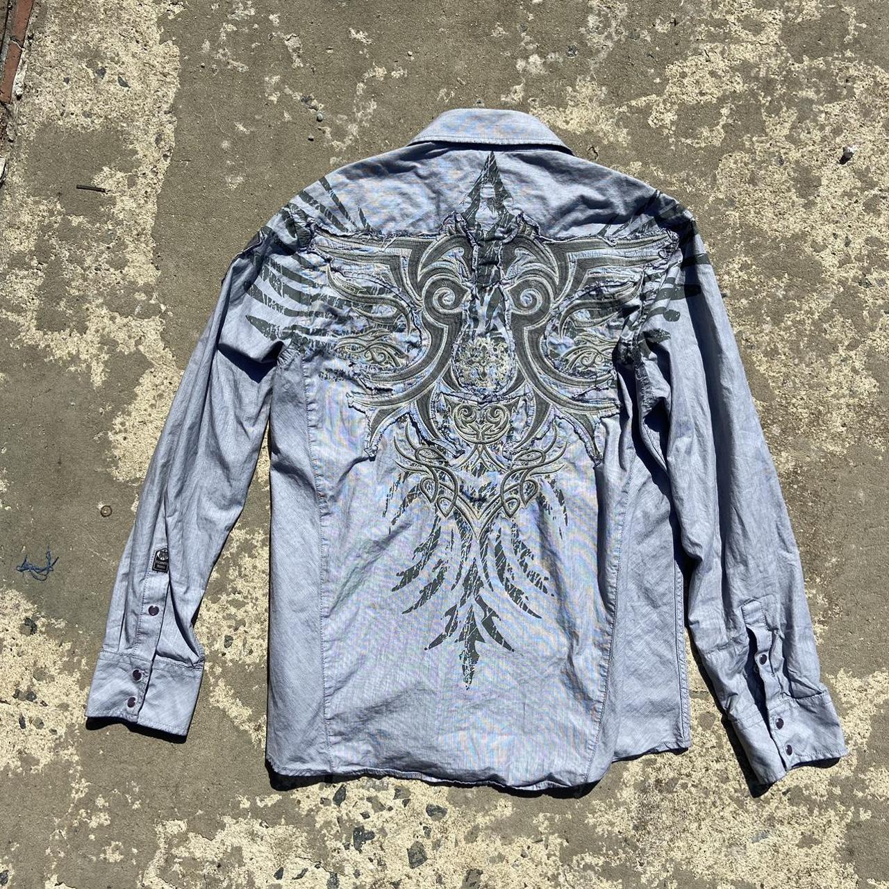 Roar embroidered button down shirt distressed... - Depop