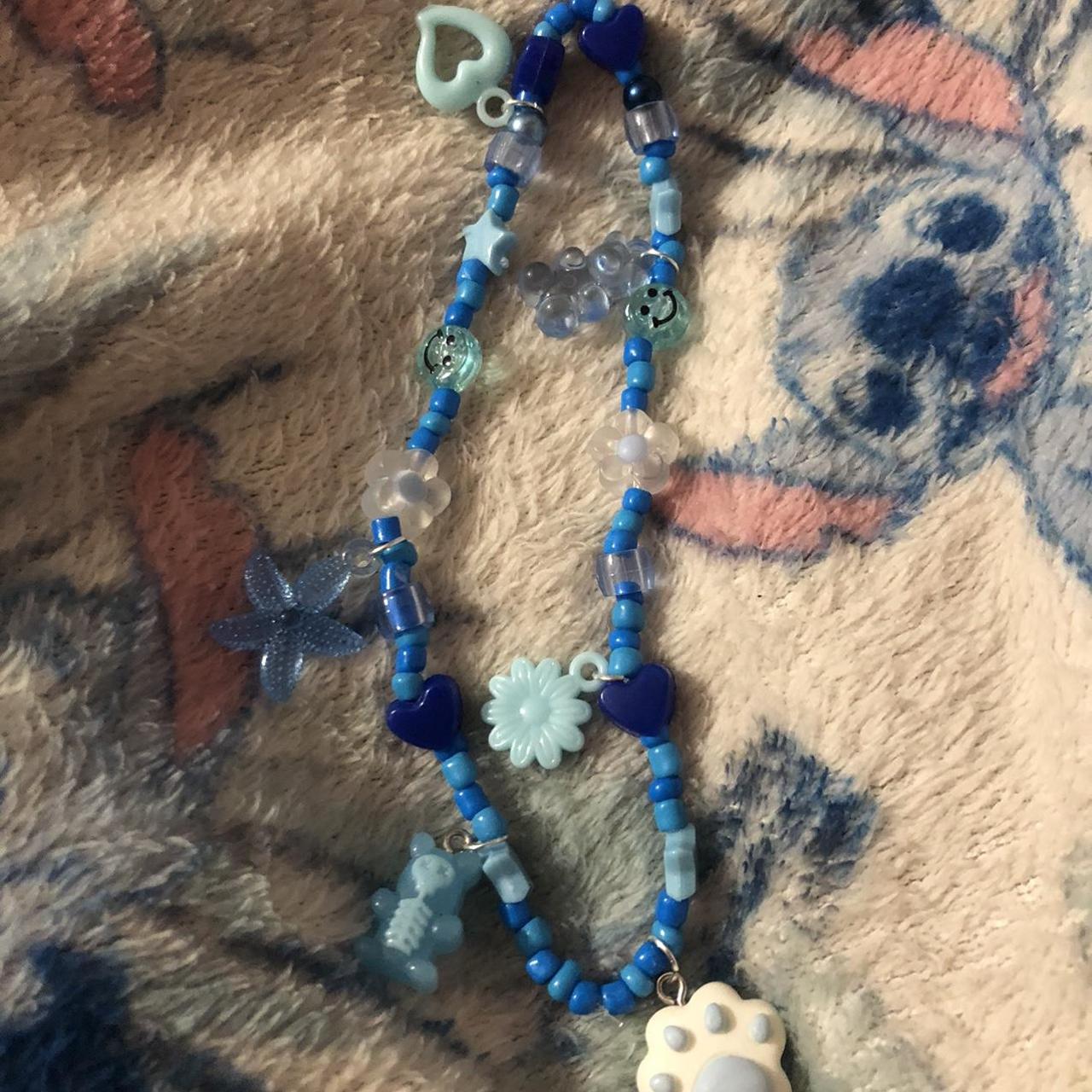 Blue phone charm / phone strap Handmade using... - Depop