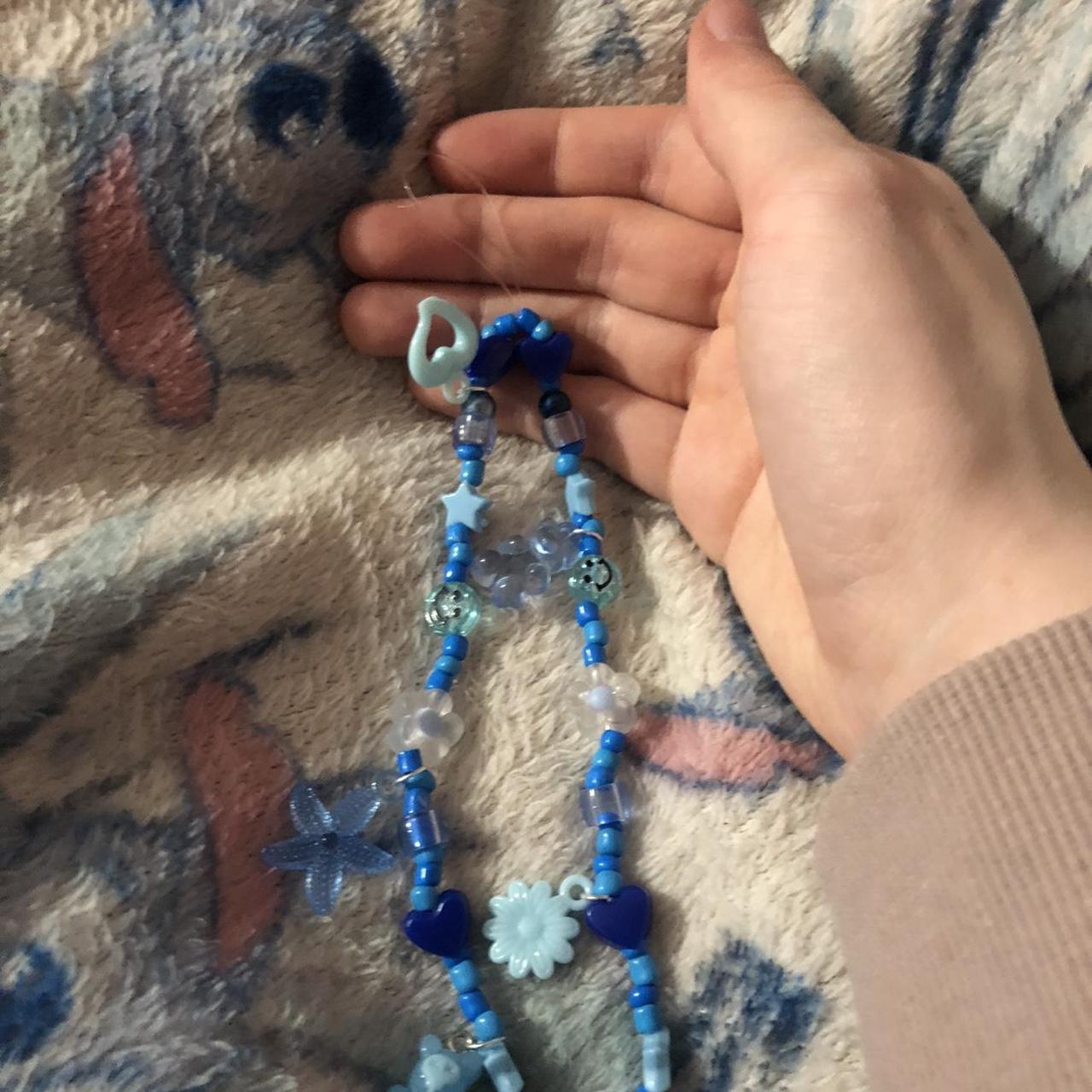 Blue phone charm / phone strap Handmade using... - Depop