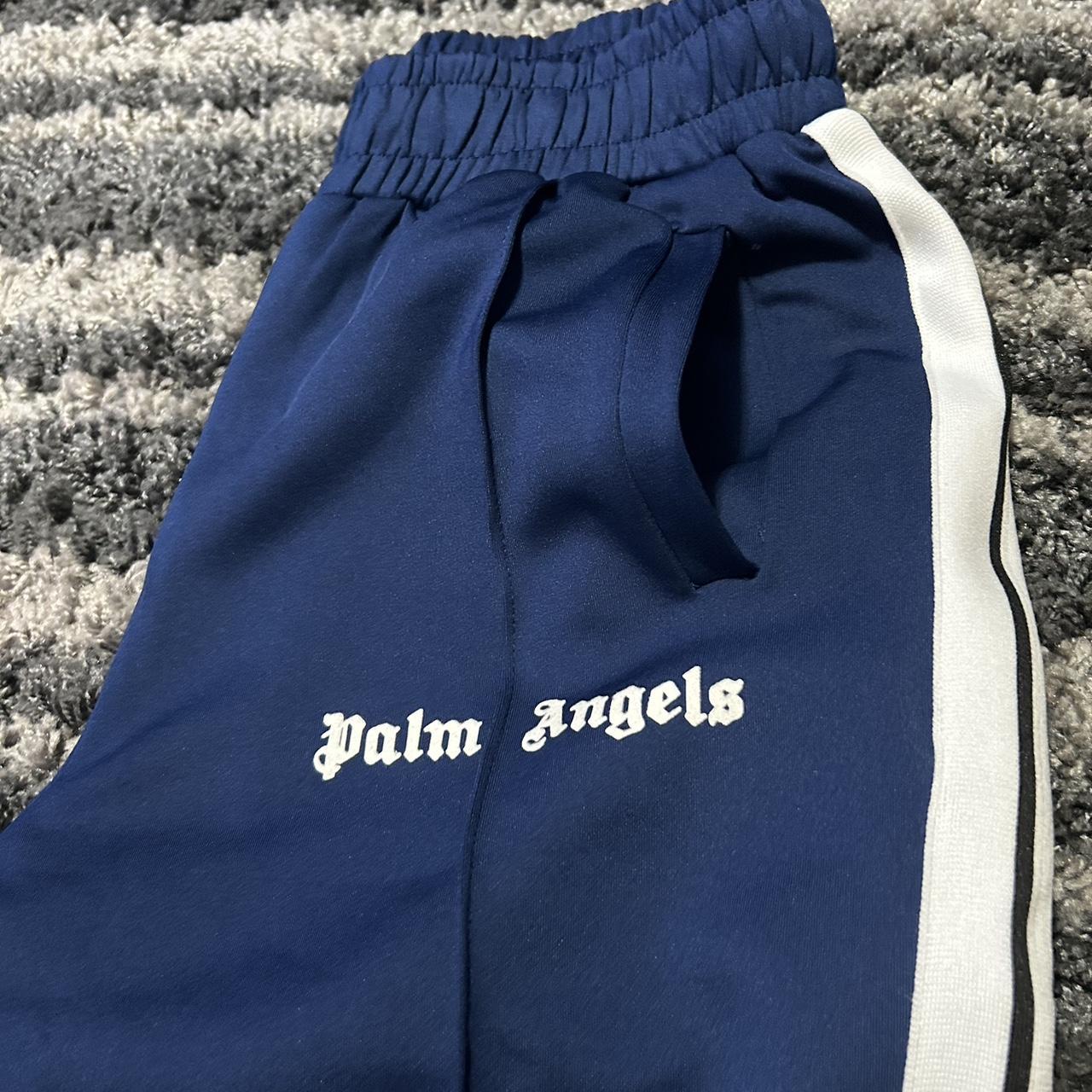 Navy blue Palm Angel track pants - Depop