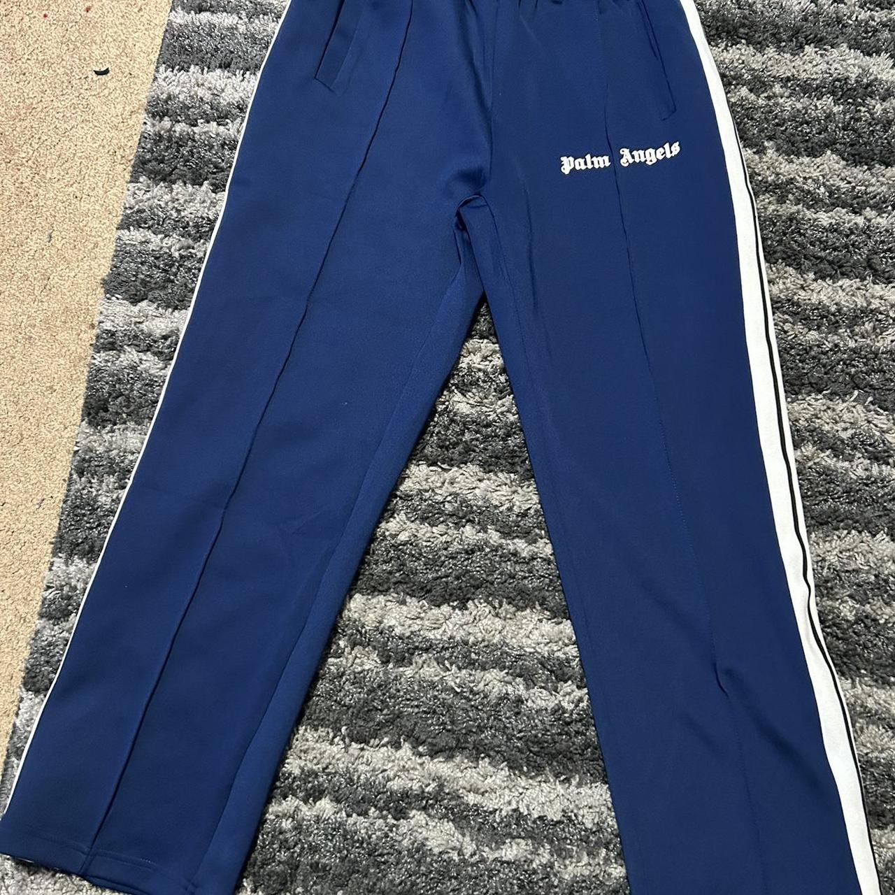 Navy blue Palm Angel track pants - Depop