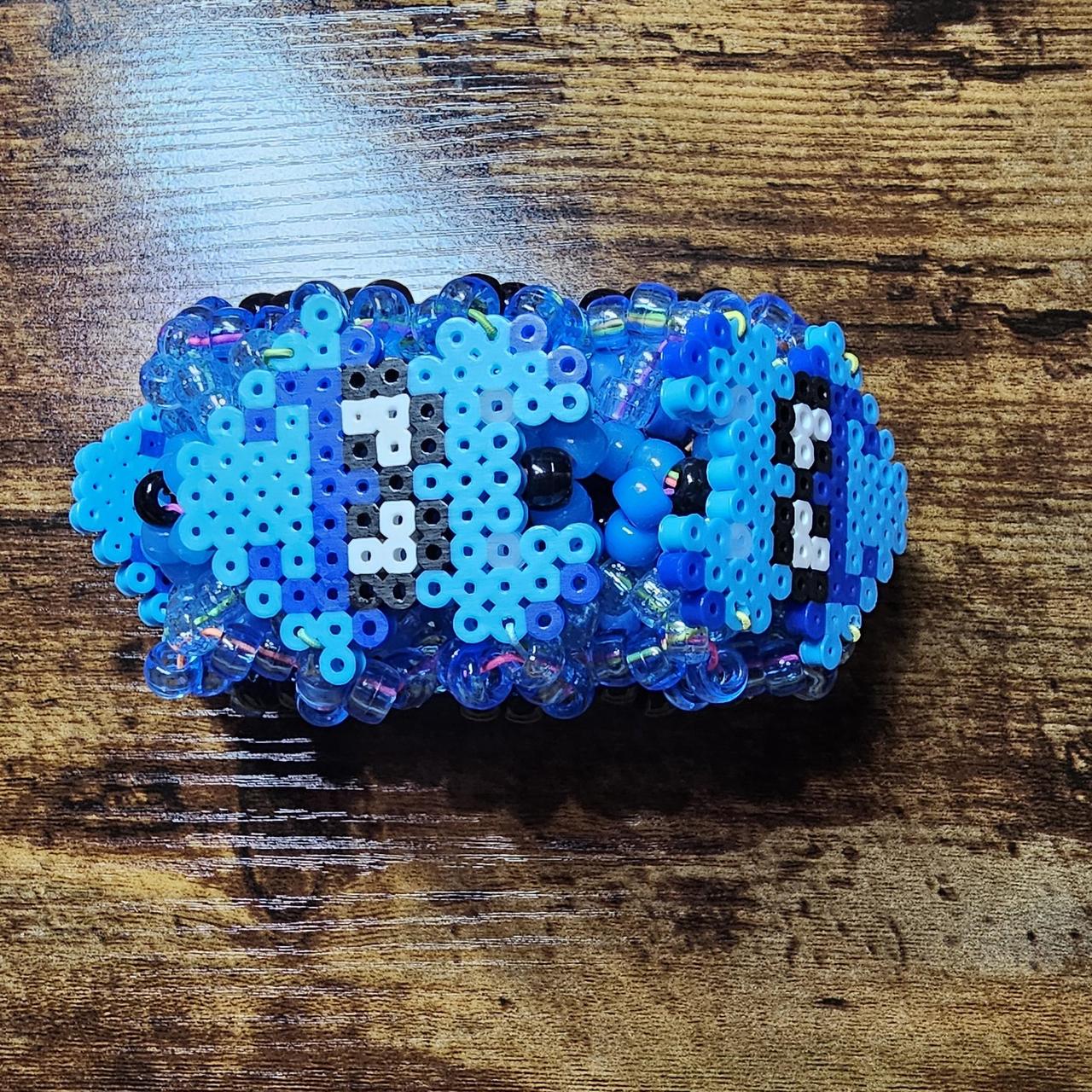 Blue splatoon cuff and booyah single | Depop