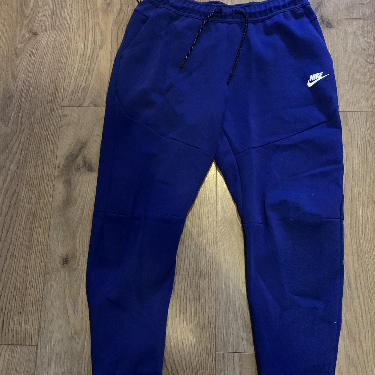 royal blue nike tech joggers little rip slight lint... - Depop