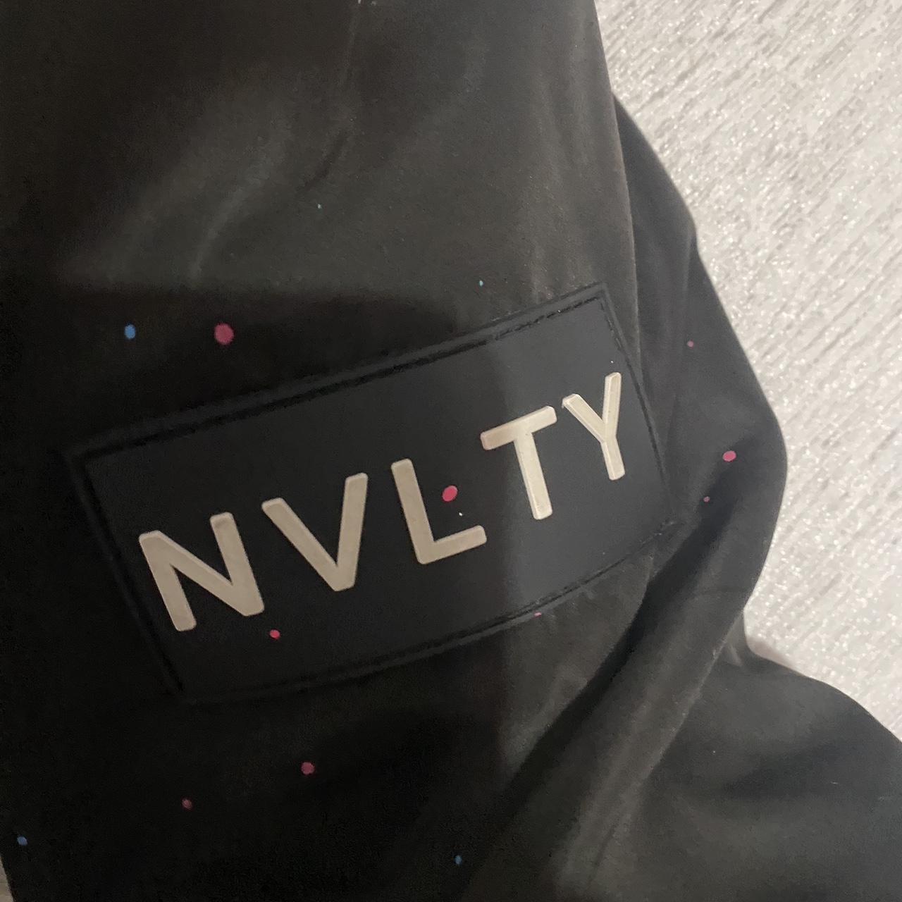 NVLTY coat Barely worn Good condition Size s adults - Depop