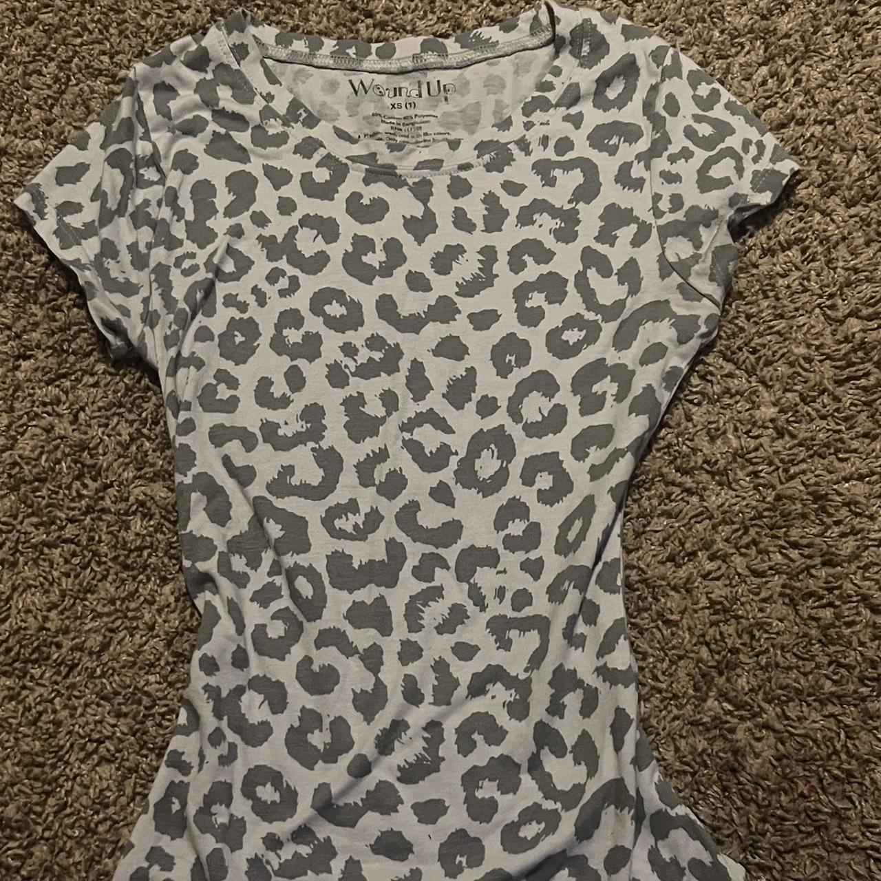 Light grey cheetah print T-shirt. 🖤 tight fitting... - Depop