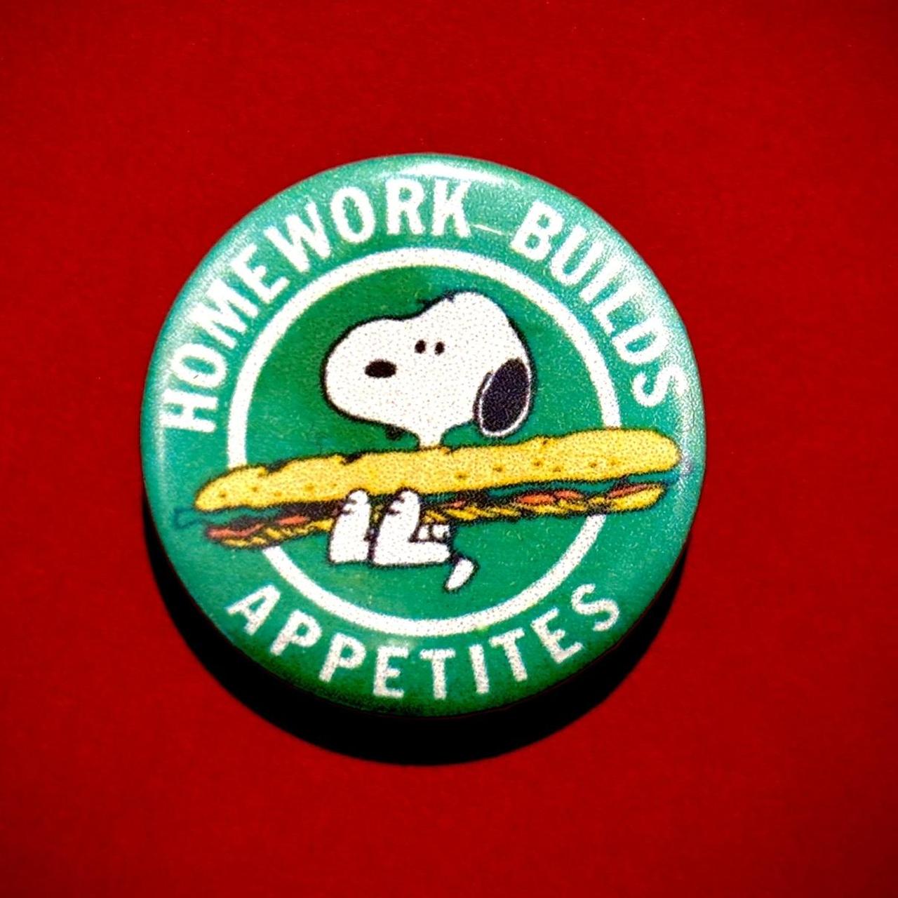 snoopy “homework builds appetites” pin ₊˚⊹♡ -1.25... | Depop