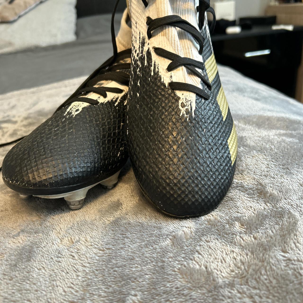 Black white and gold pair of adidas predators size 9... - Depop