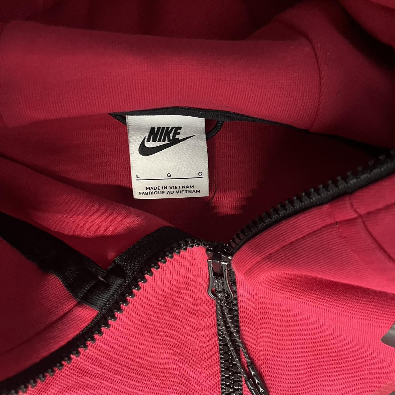 Red Nike Tech men’s size large color is a reddish... - Depop