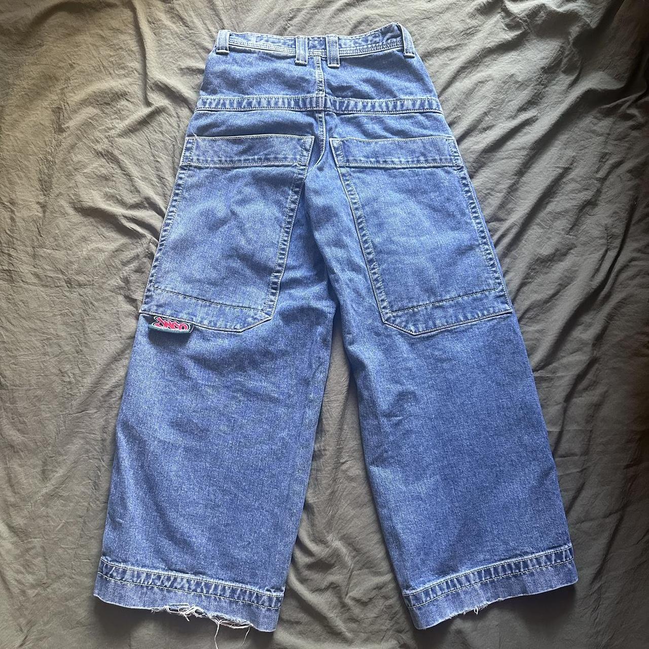 26 leg opening JNCO -stain on left leg -28 waist... - Depop