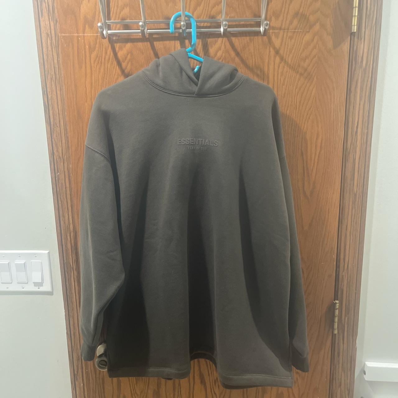 dark green essentials hoodie brand new - Depop