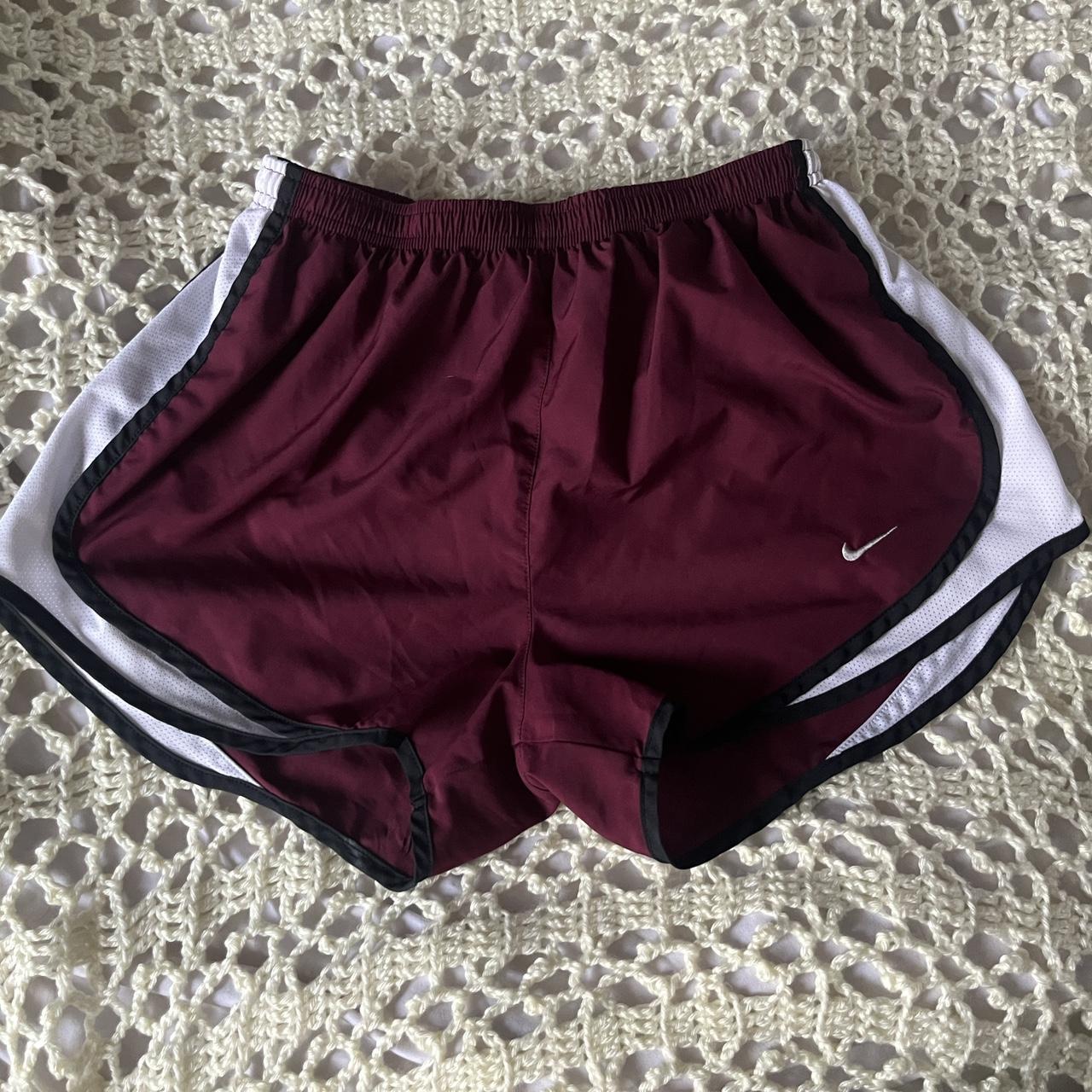 maroon nike shorts !! SIZE: M good condition!! msg... - Depop