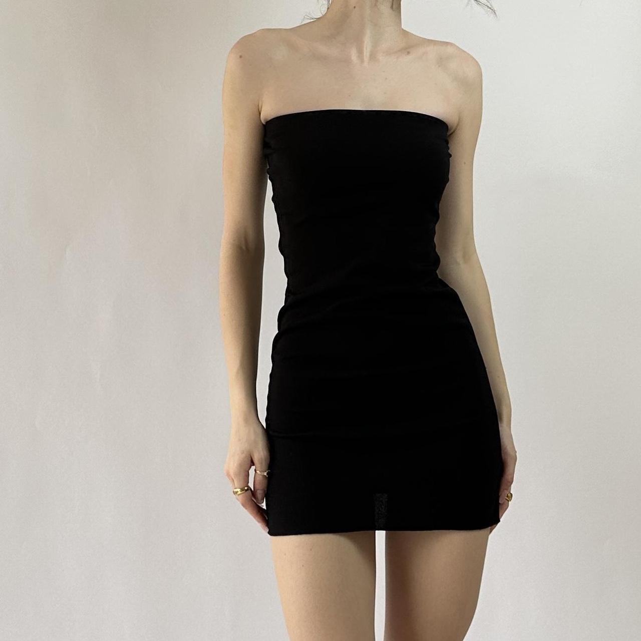 Black mini dress Slight stretch Elastic at the top... - Depop