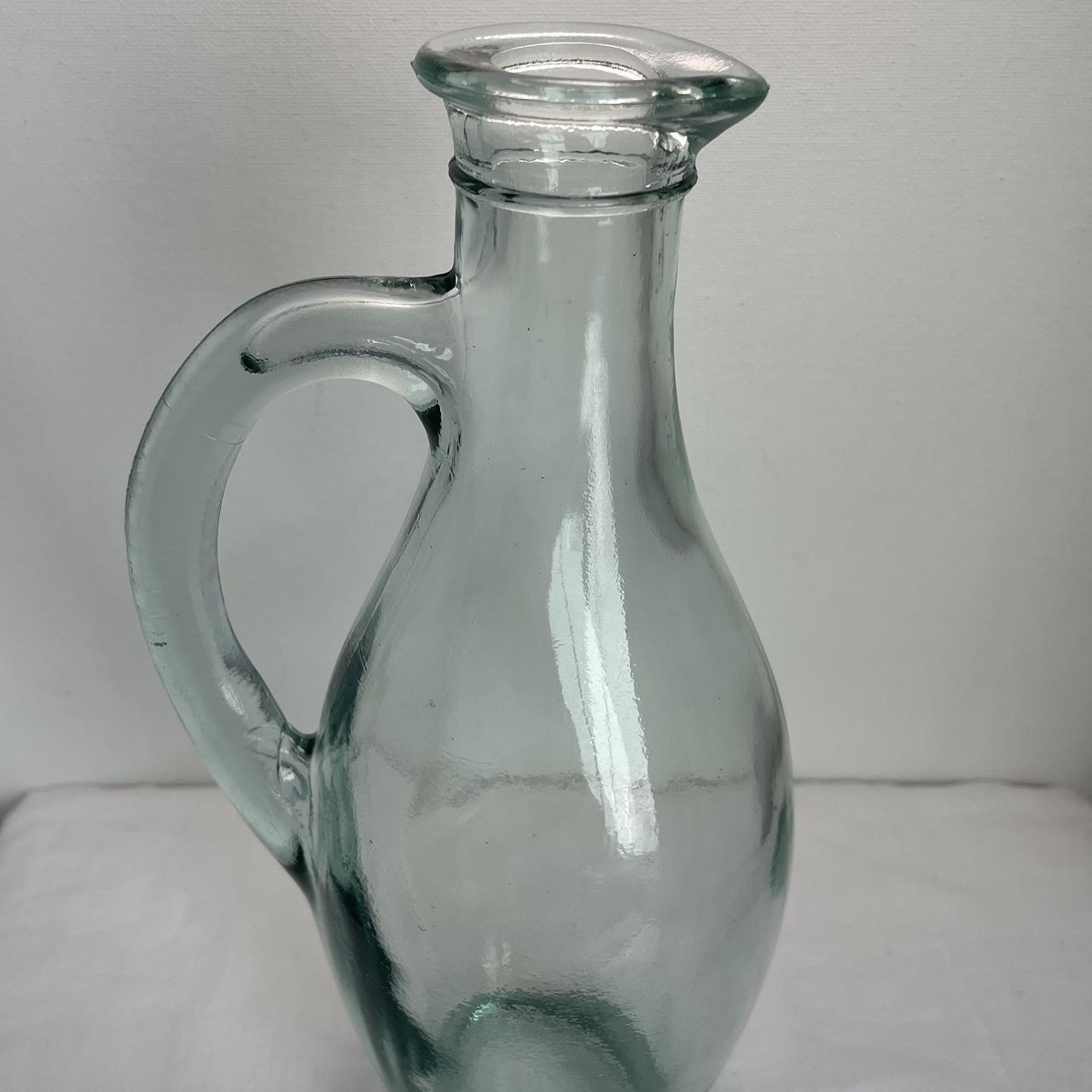 Tall green thick glass pitcher with handle. Used in... - Depop