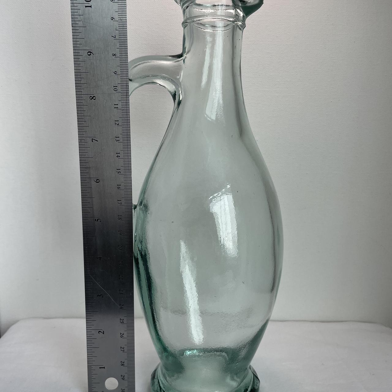 Tall green thick glass pitcher with handle. Used in... - Depop