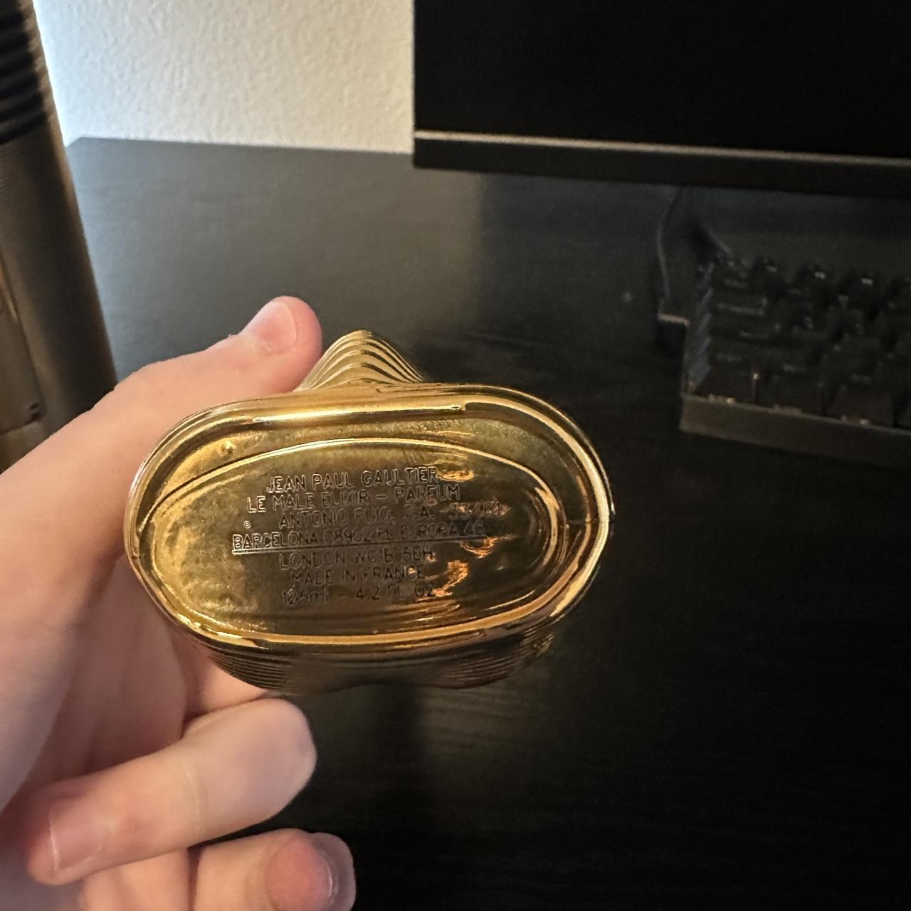 Jean paul gaultier le male elixer about 90% full and... - Depop