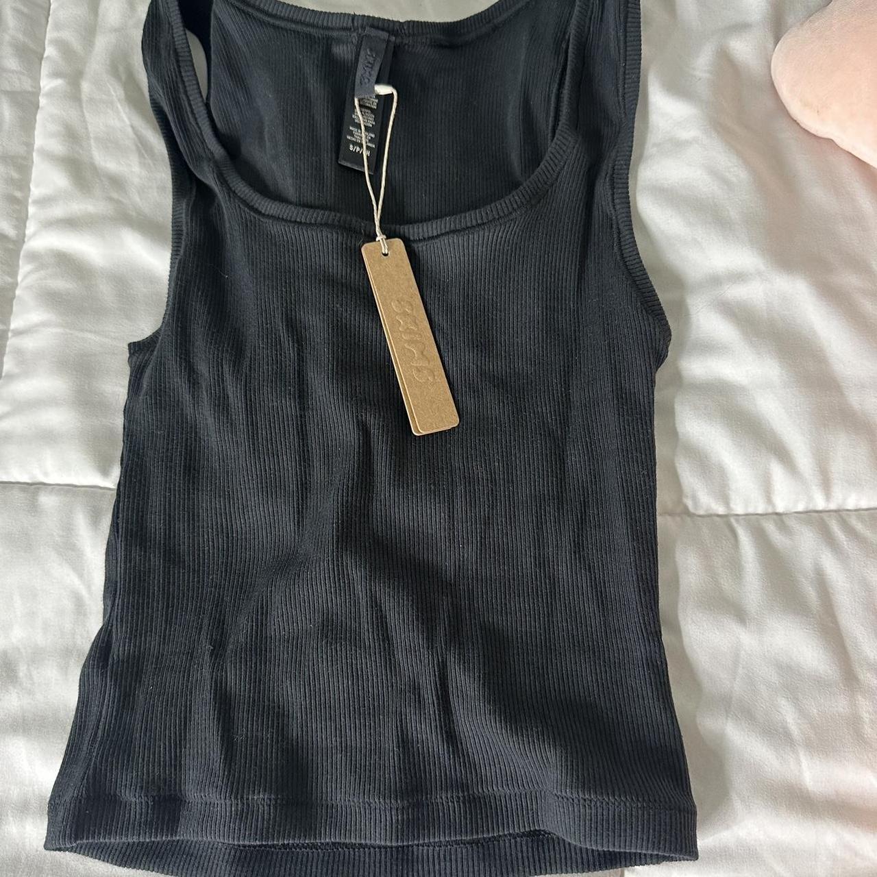 Brand new skims tank 🖤 Super cute and stylish... - Depop