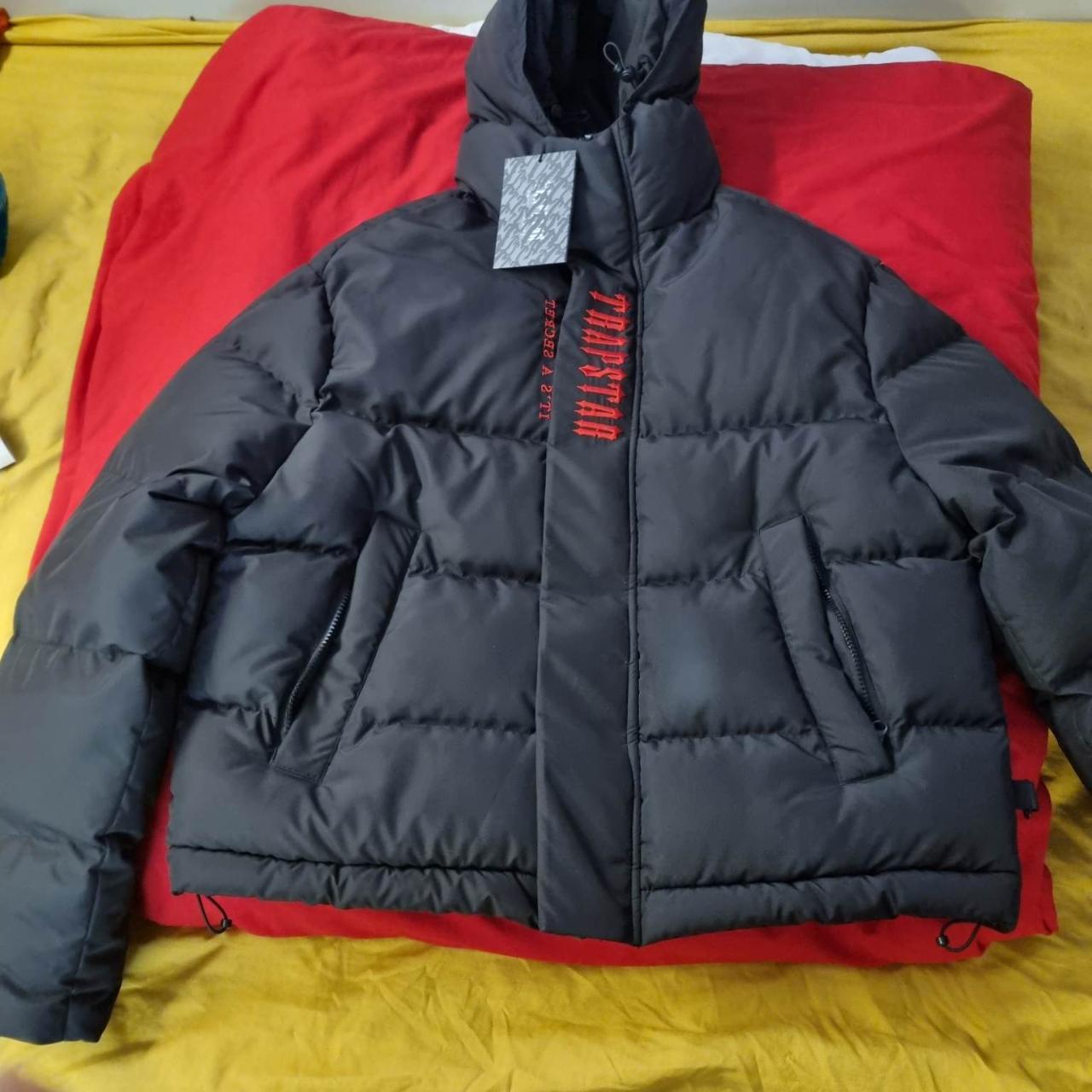 This is the "TRAPSTAR DECODED HOODED PUFFER JACKET... - Depop