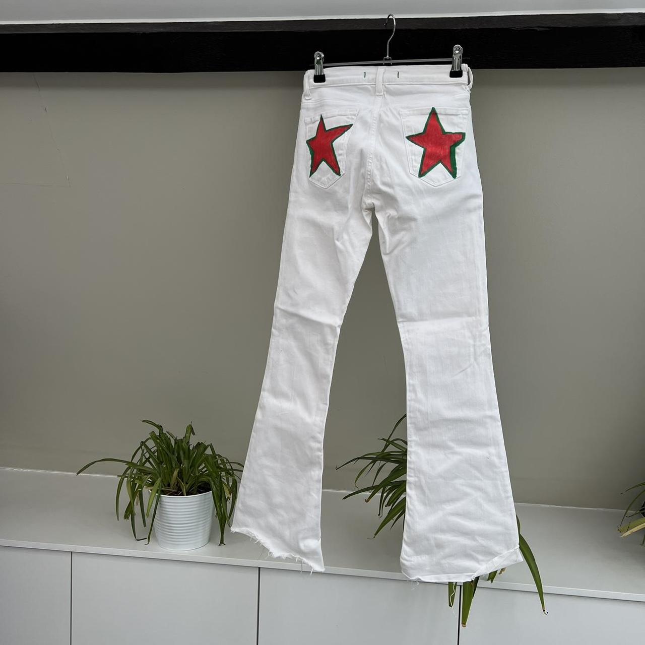 Incredible low rise white jeans with bespoke red and... - Depop