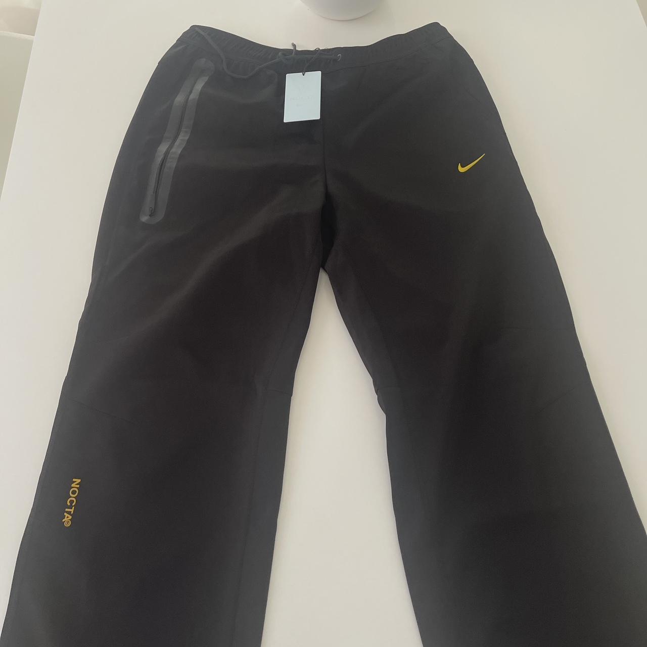 NOCTA x TECH FLEECE PANTS (BLACK and YELLOW) - Depop