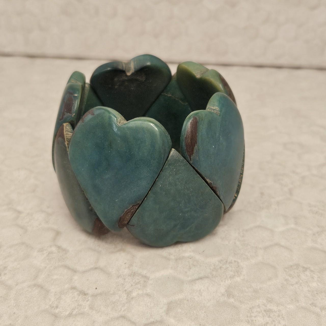 Elasticated turquoise green heart-shaped stone... | Depop