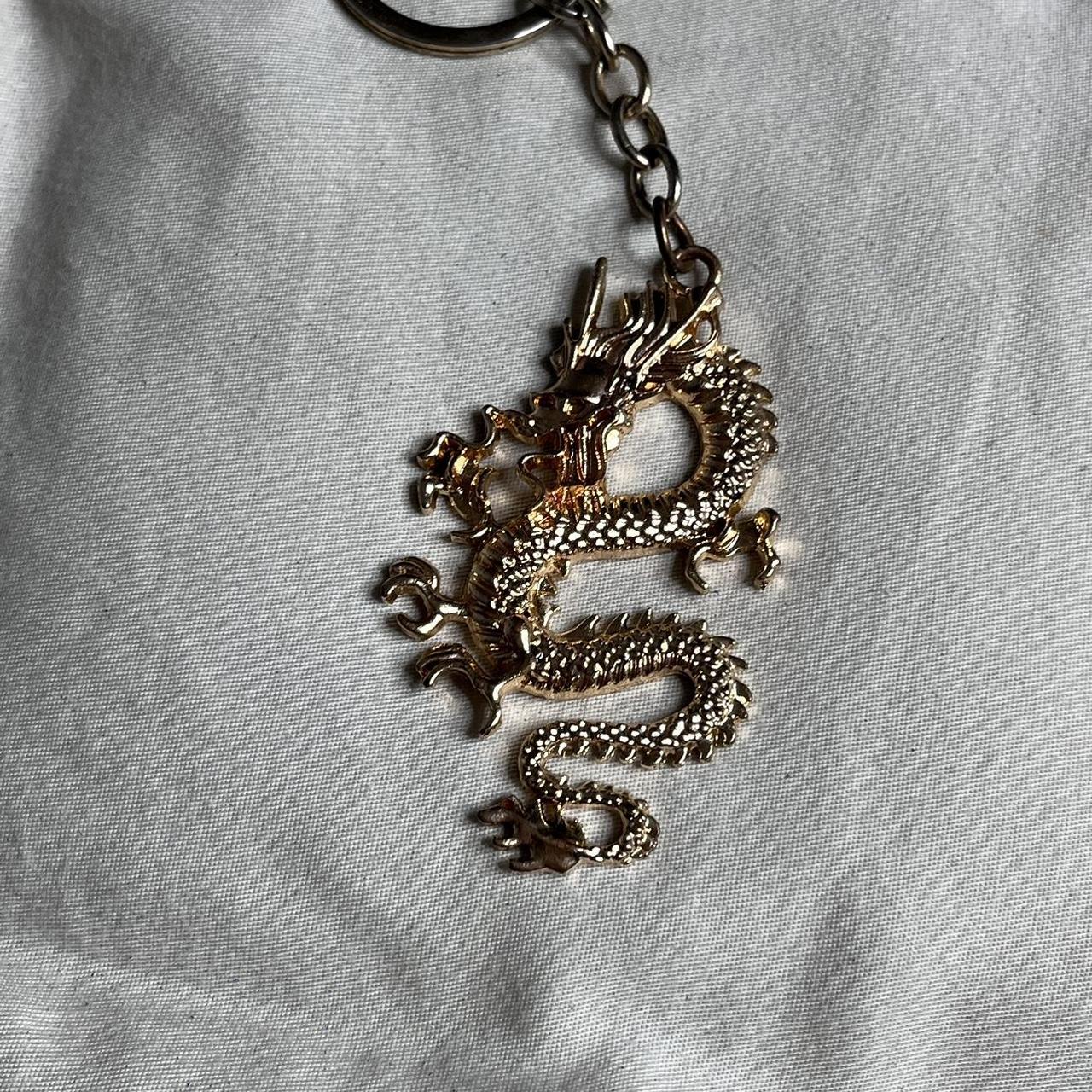 gold kimono dragon key chain - Depop