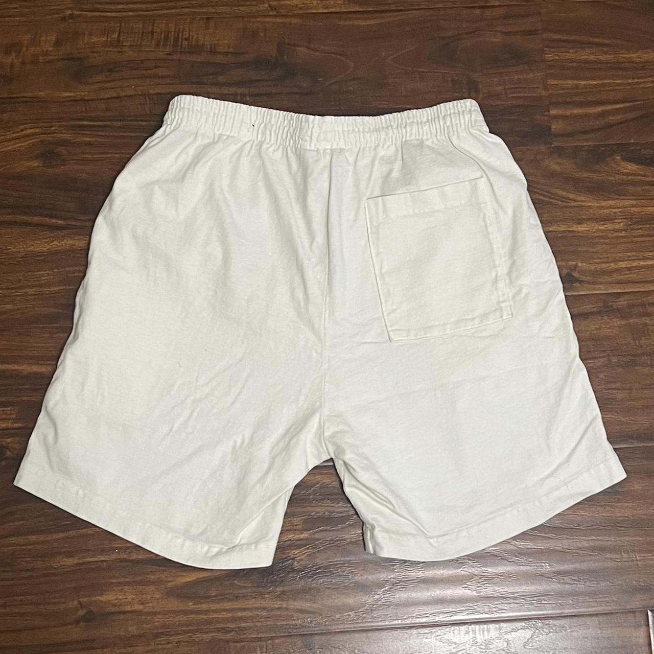 demon slayer zenitsu shorts size small, third photo... - Depop