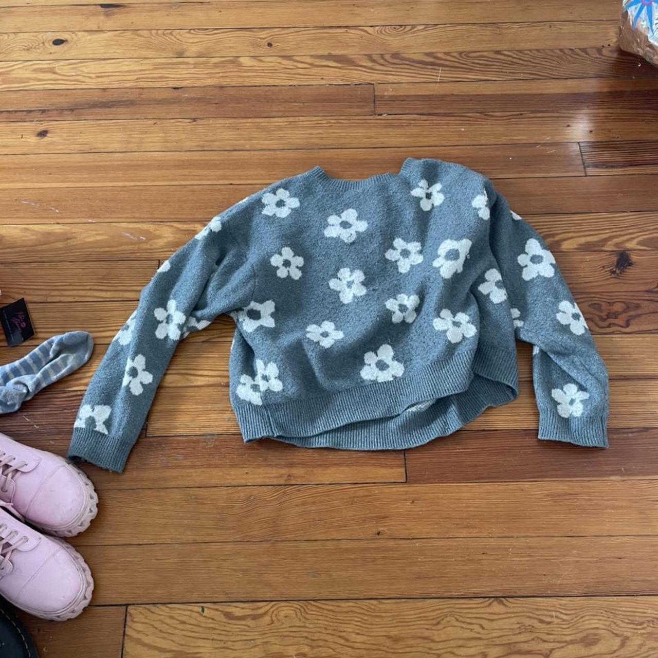 soft blue sweater with white flower decal - Depop