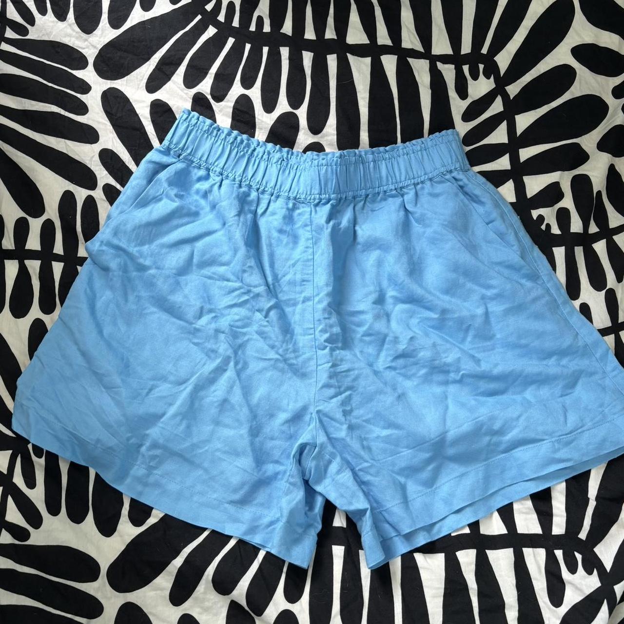 Blue linen shorts with elastic waistband. Size... - Depop