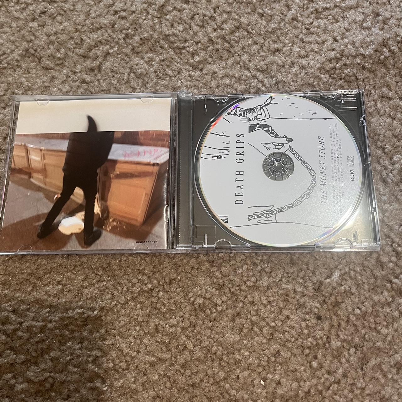 Death Grips “The Money Store” CD Cd is in excellent... - Depop