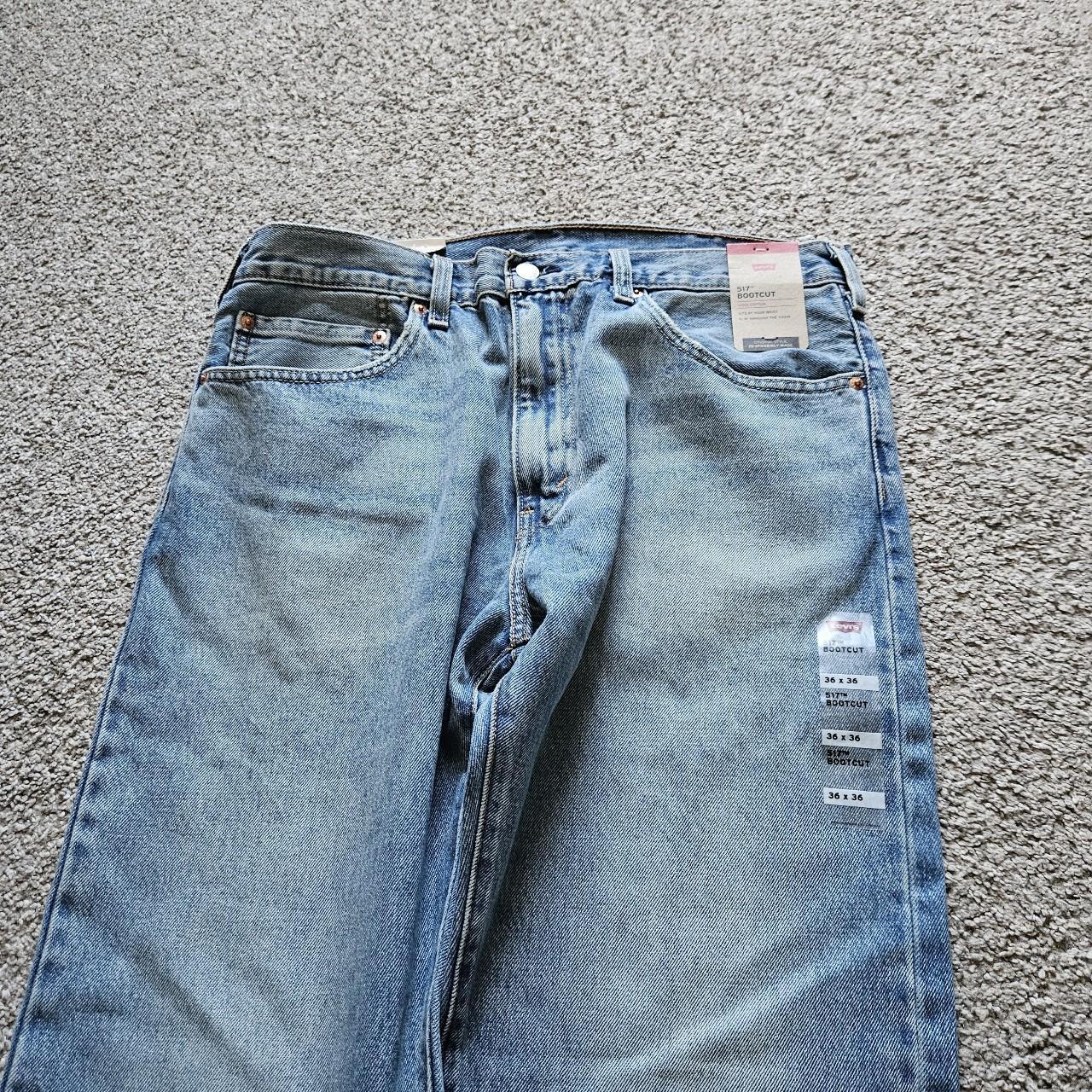 long stacked bootcut levi jeans with a beautiful... - Depop