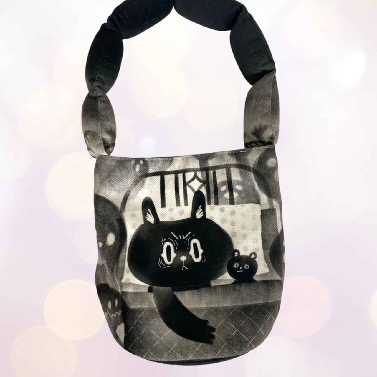 cute bucket bag with unique print and cotton-filled... - Depop