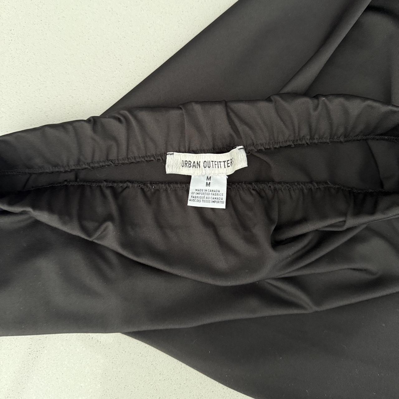 Urban Outfitters Black midi skirt, very elastic... | Depop
