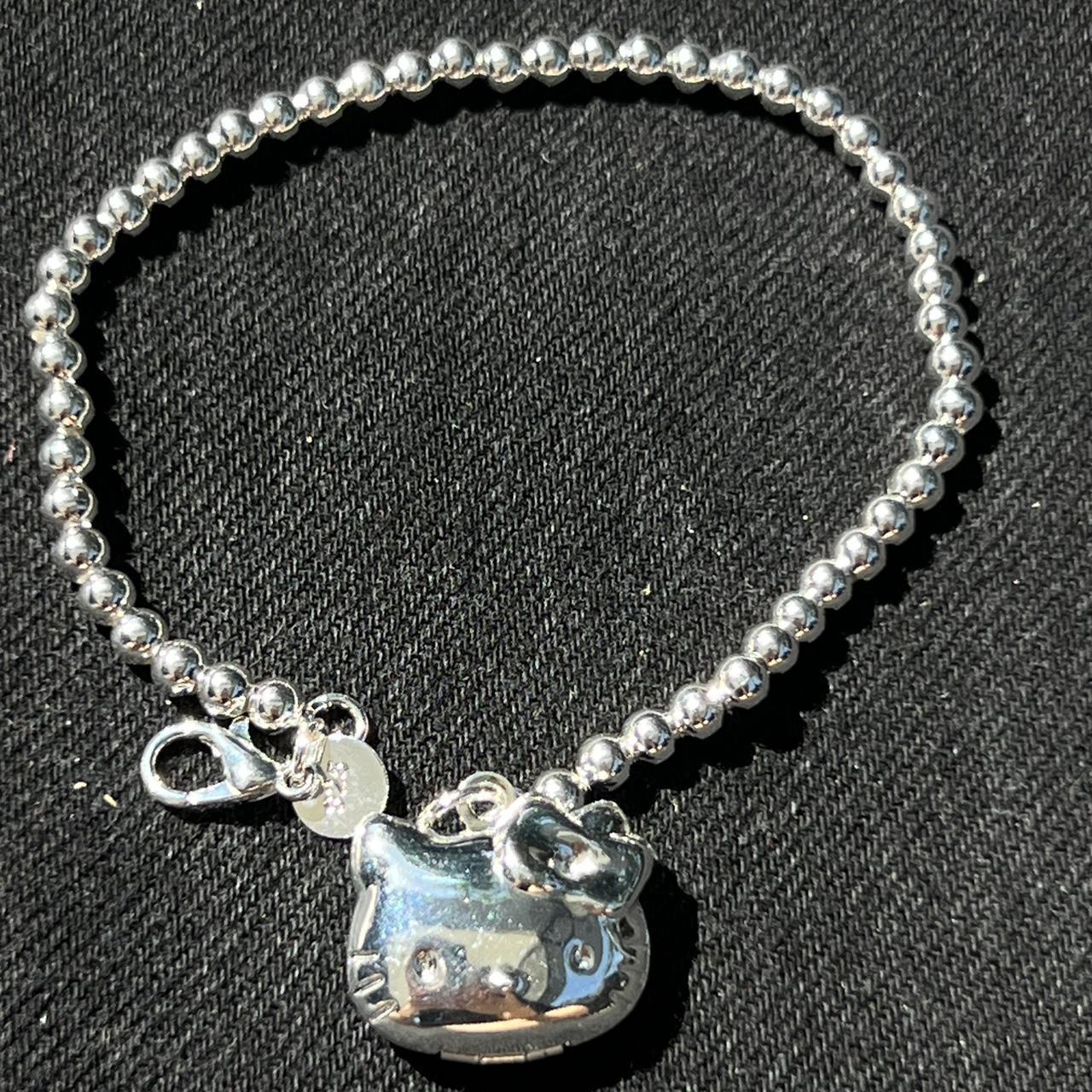 silver hello kitty locket bracelet stamped with... - Depop