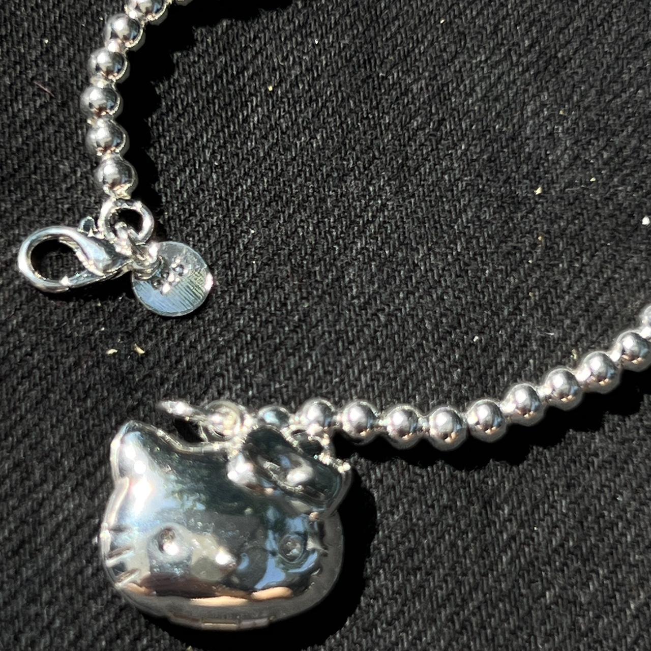 silver hello kitty locket bracelet stamped with... - Depop