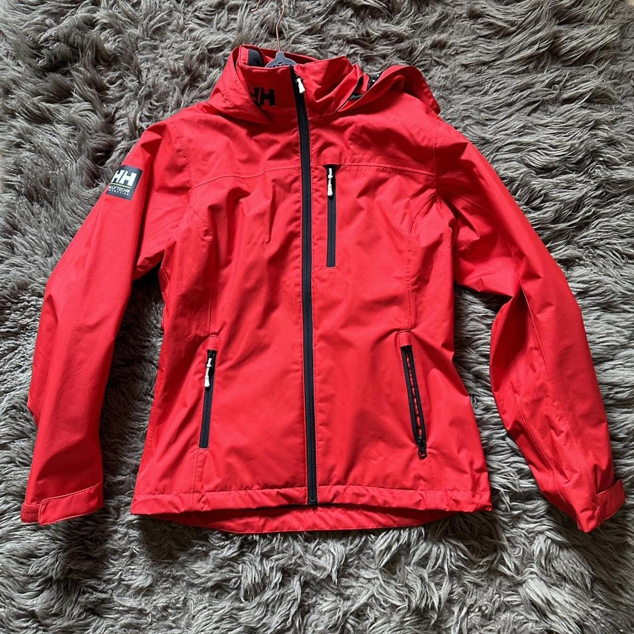 red Helly Hansen rain/wind jacket never been worn... - Depop