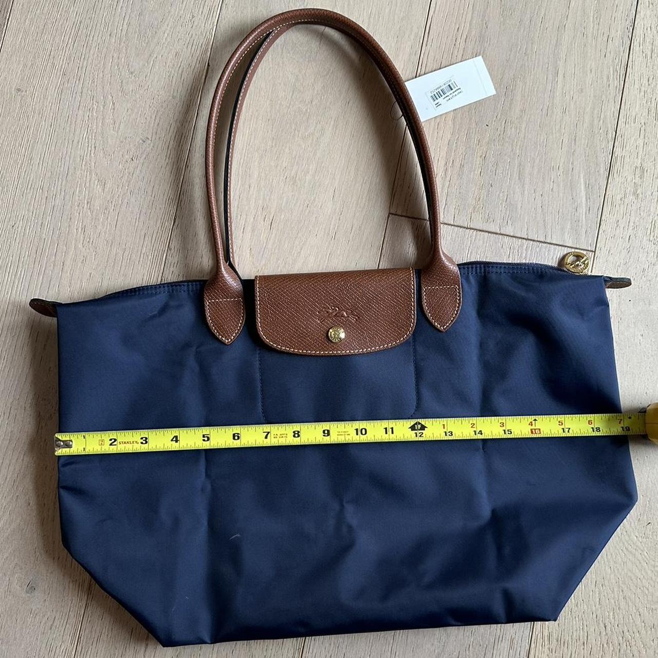 navy blue long champ bag - has a few noticeable... - Depop