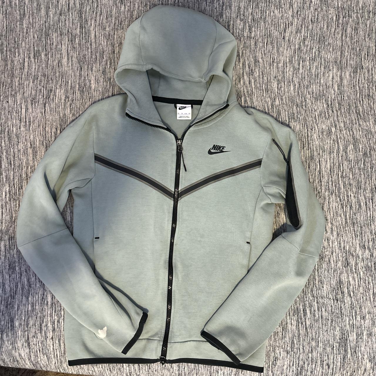 Mica Green Nike Tech top Signs of wear on the... - Depop